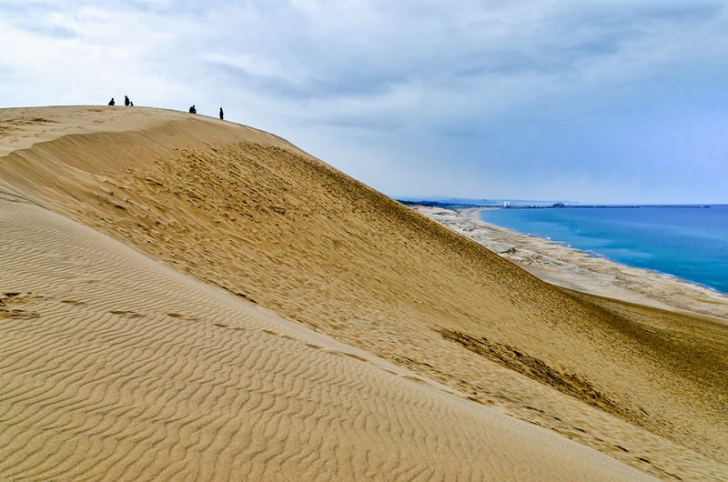 Giant Tottori Sand Dunes overlook the Sea of Japan. Tottori Prefecture, Japan.